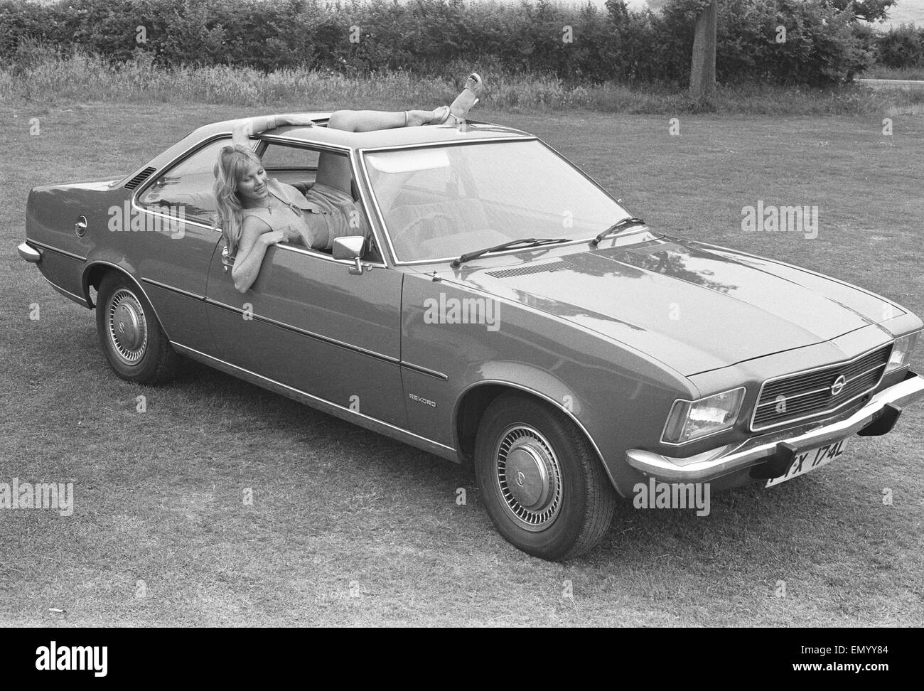 Reveille model Angela Jay seen here posing with a Opel Kadett car first ...
