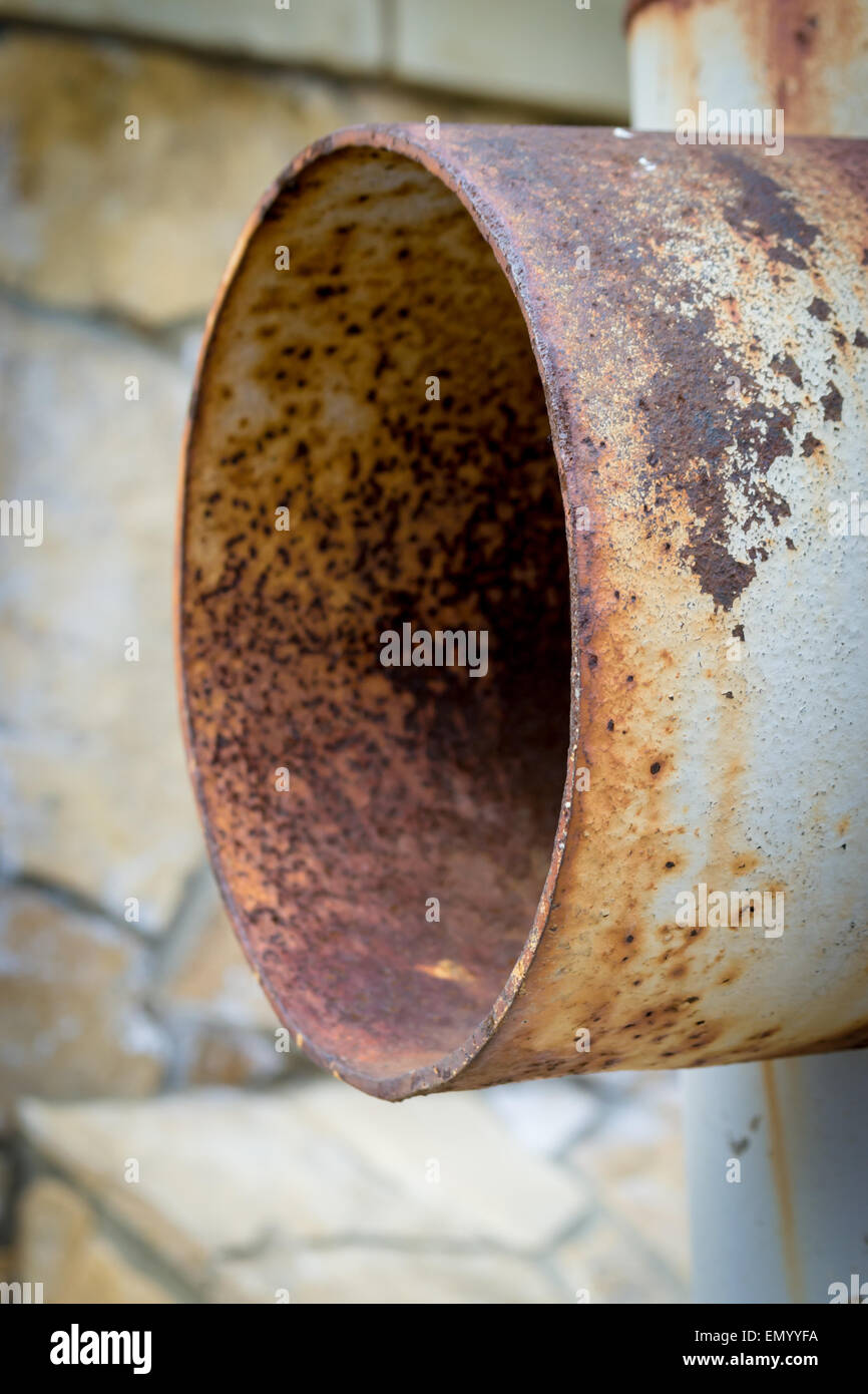 Single rusty metal pipe no liquid and is dry Stock Photo - Alamy
