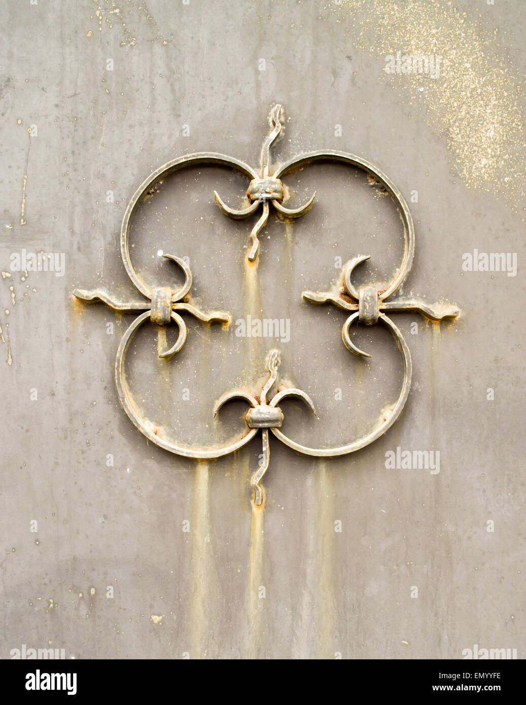 Barb iron design with rust bleeds on brown metallic paint Stock Photo ...