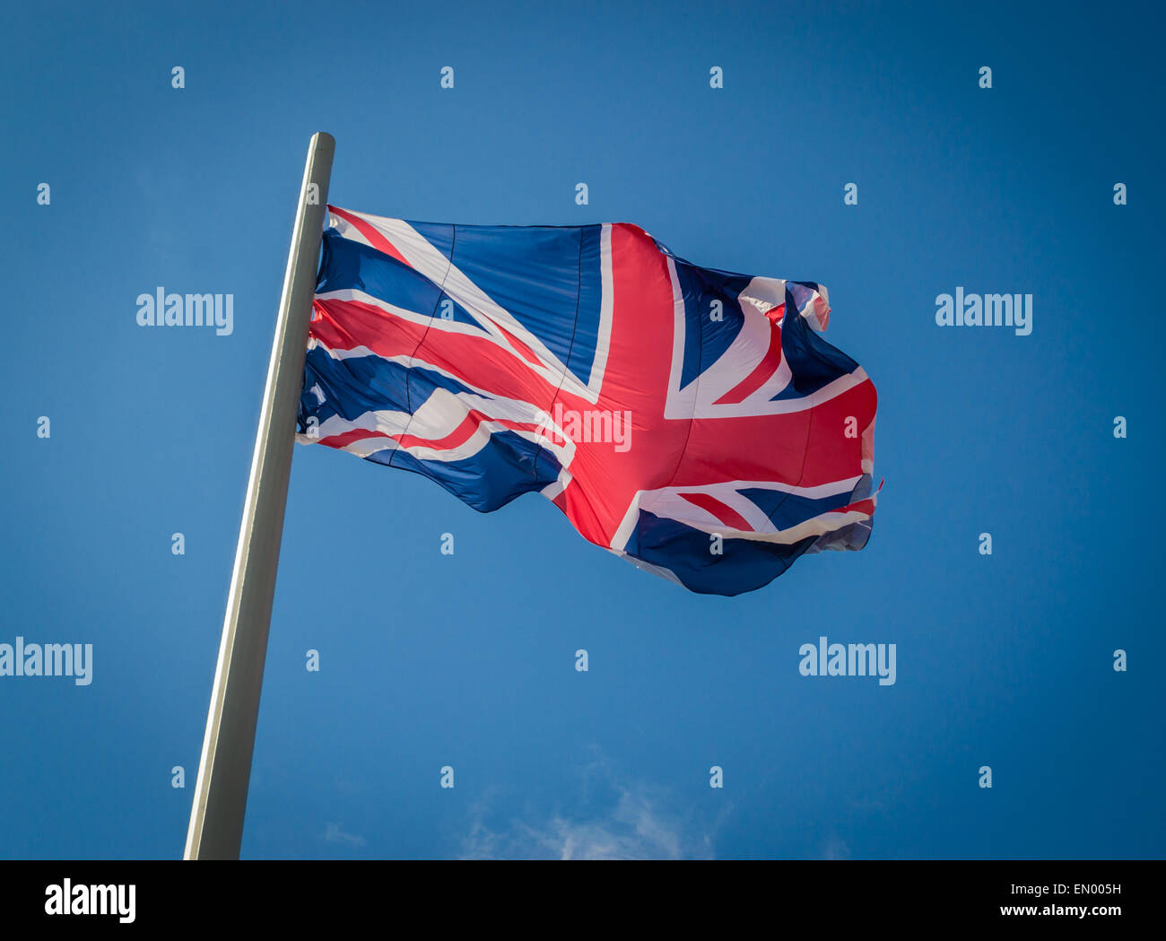 The Union Jack as a symbol of the United Kingdom flapping in the breeze ...