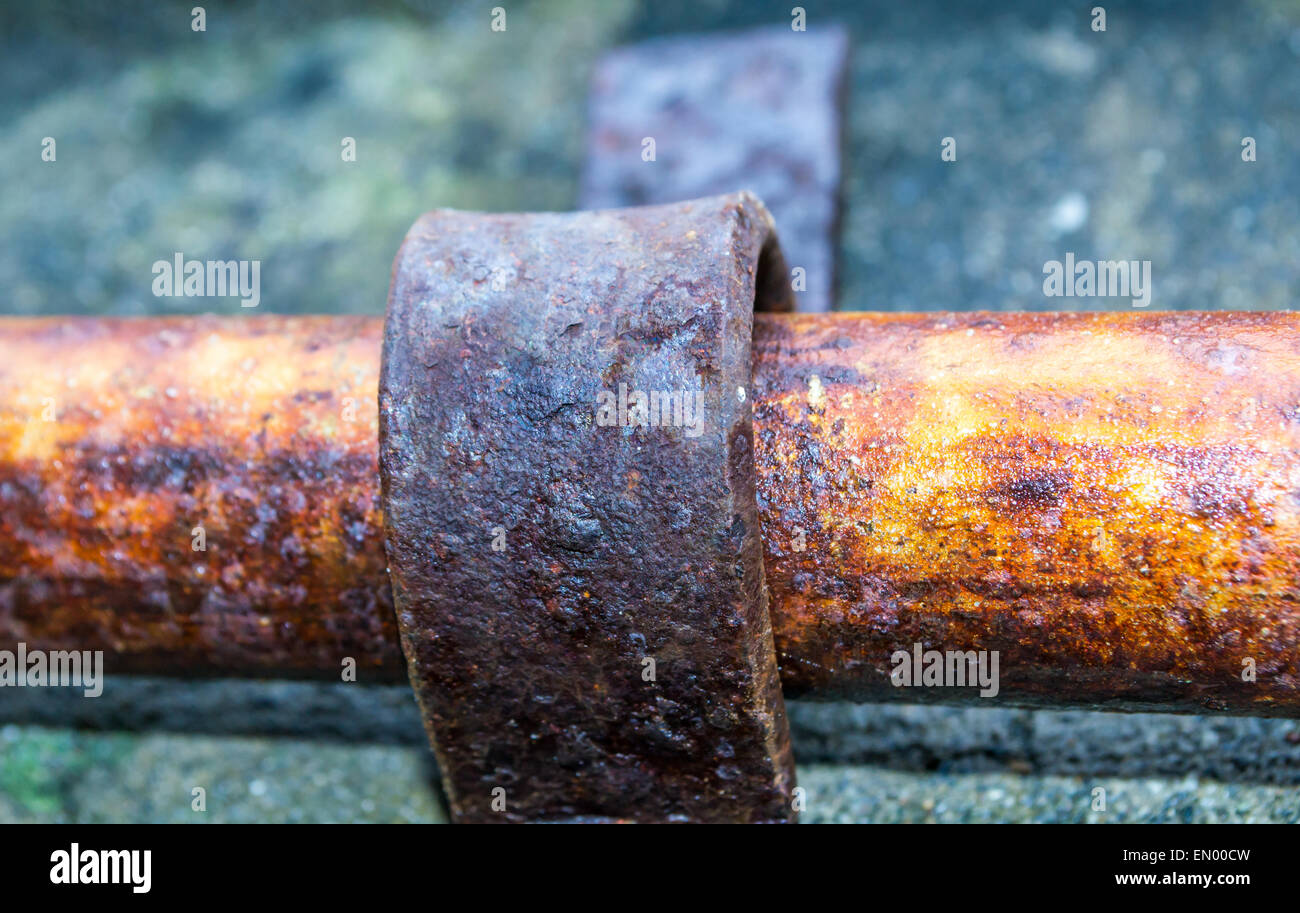 Rusty pipe with flecks of rust peeling off Stock Photo - Alamy