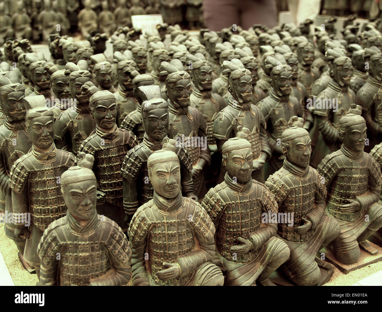 Models of grey coloured colored terracotta warriors army in rows in Xi ...