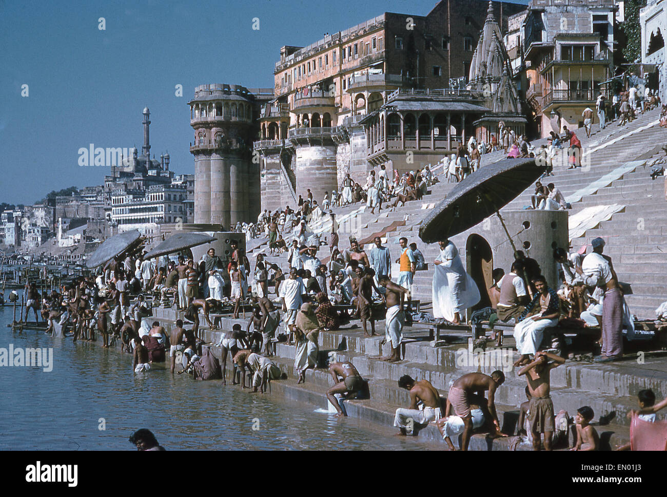 1960s, India, Benares, river side at the Ganges. indians gather to ...