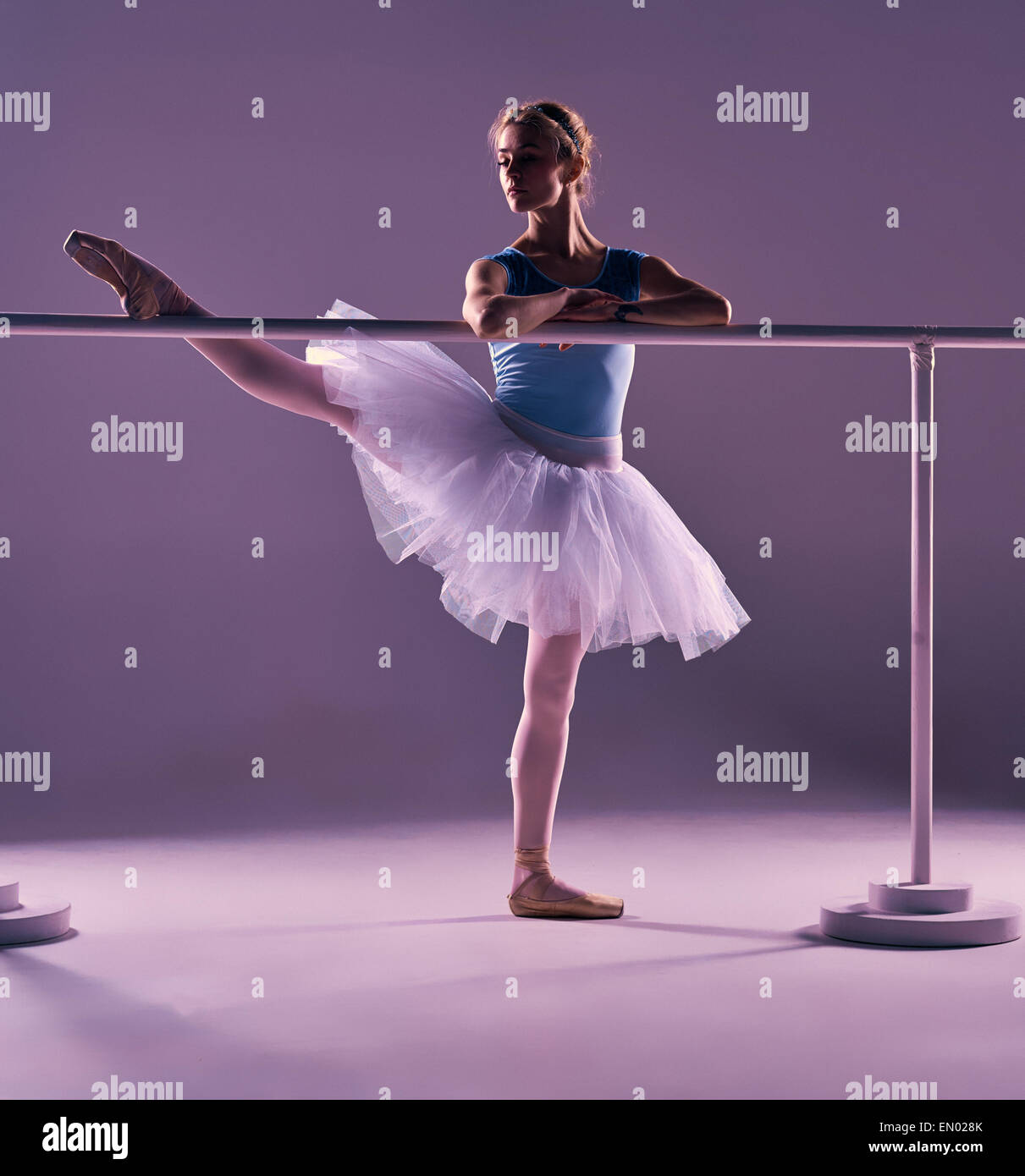 classic ballerina posing at ballet barre Stock Photo - Alamy