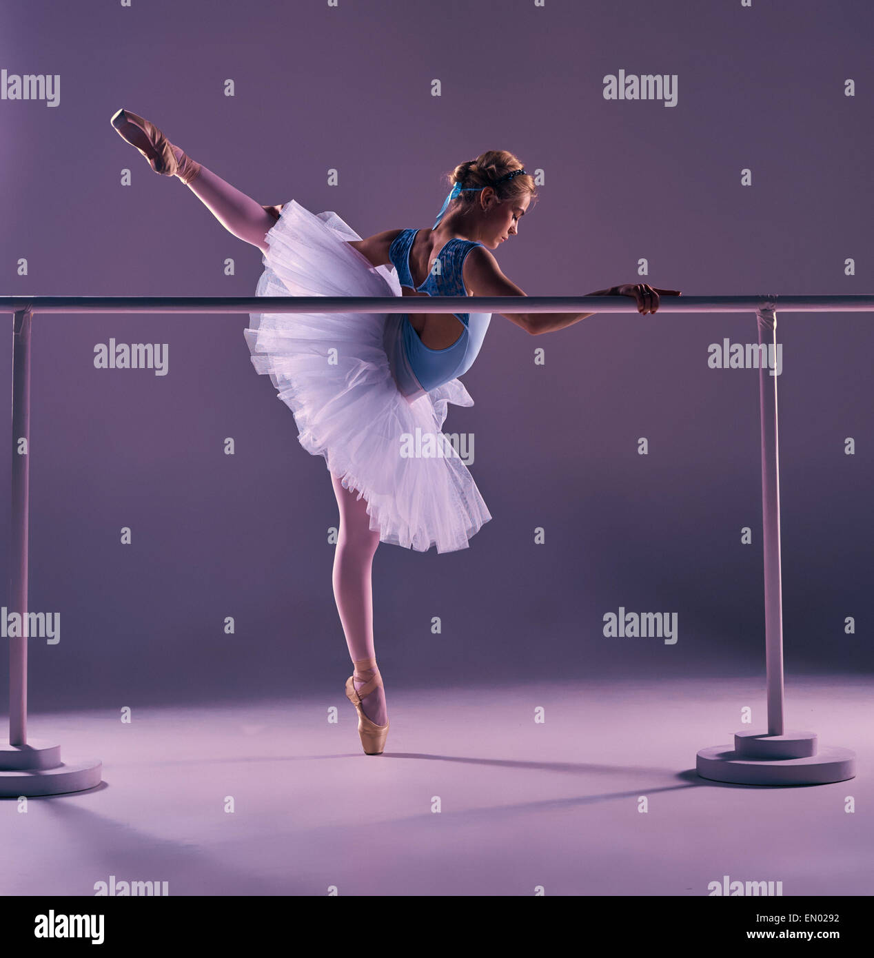 classic ballerina posing at ballet barre Stock Photo - Alamy