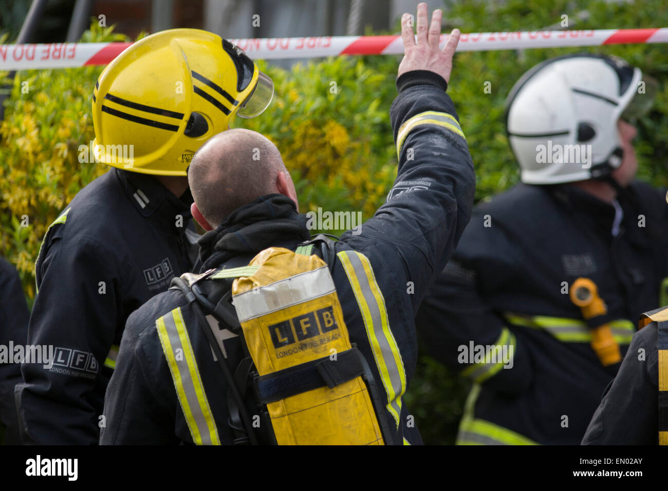 London Fire Brigade (LFB) firefighters attend a roof fire in Herne Hill ...