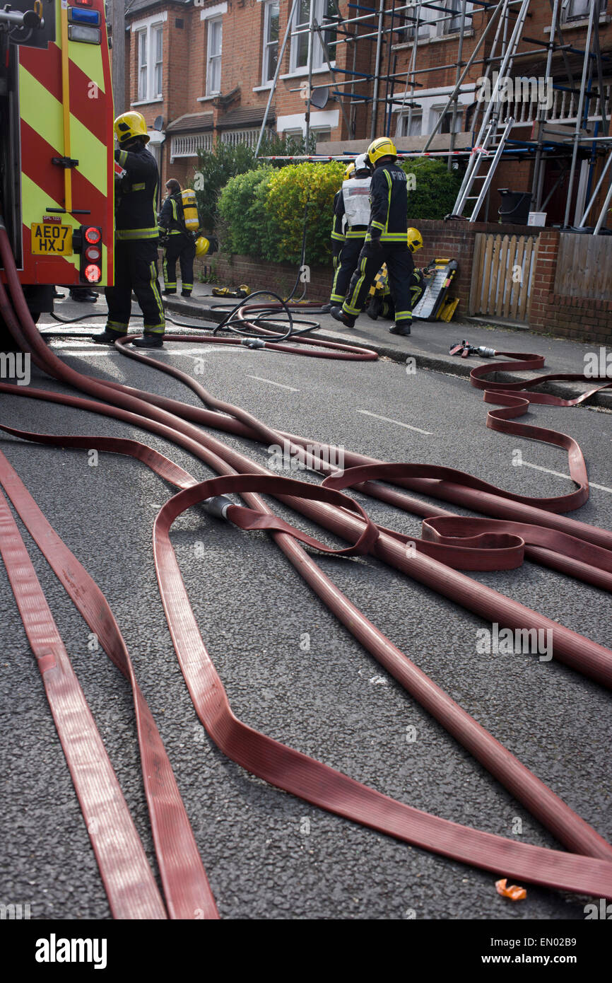 London Fire Brigade (LFB) firefighters attend a roof fire in Herne Hill ...