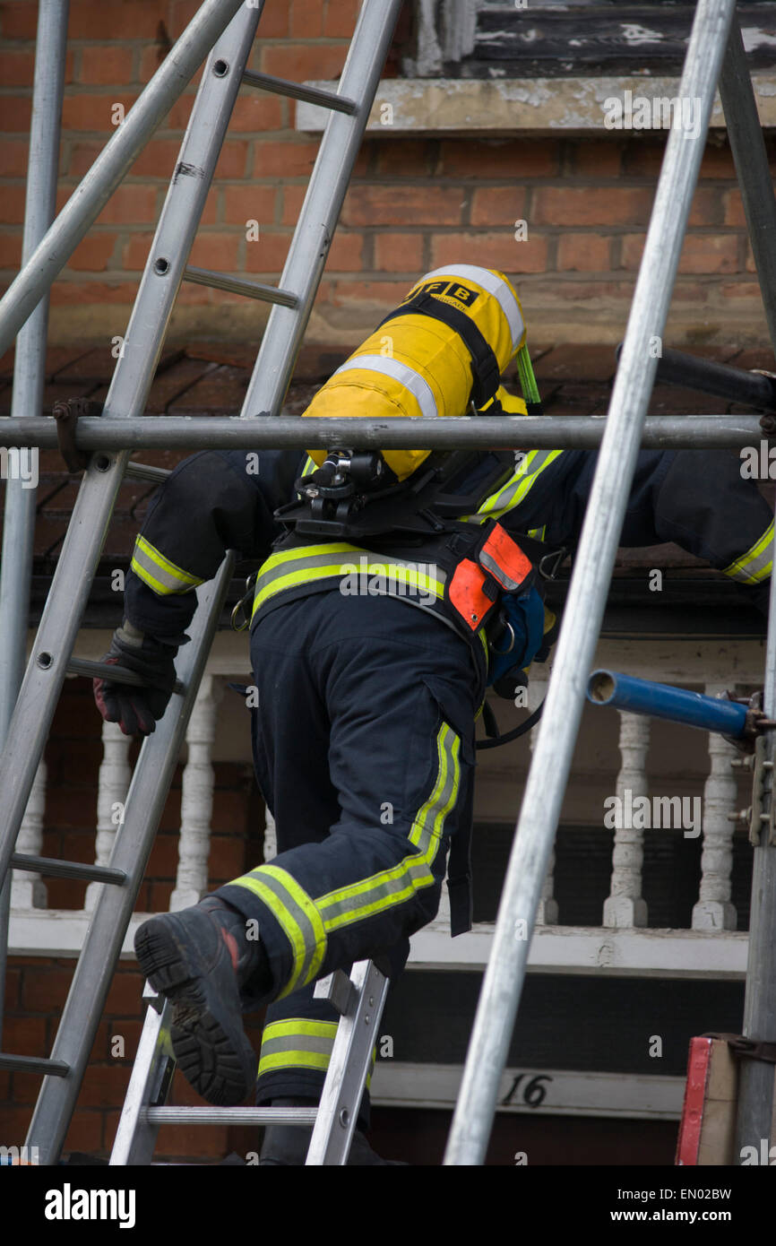 London Fire Brigade (LFB) firefighters attend a roof fire in Herne Hill ...