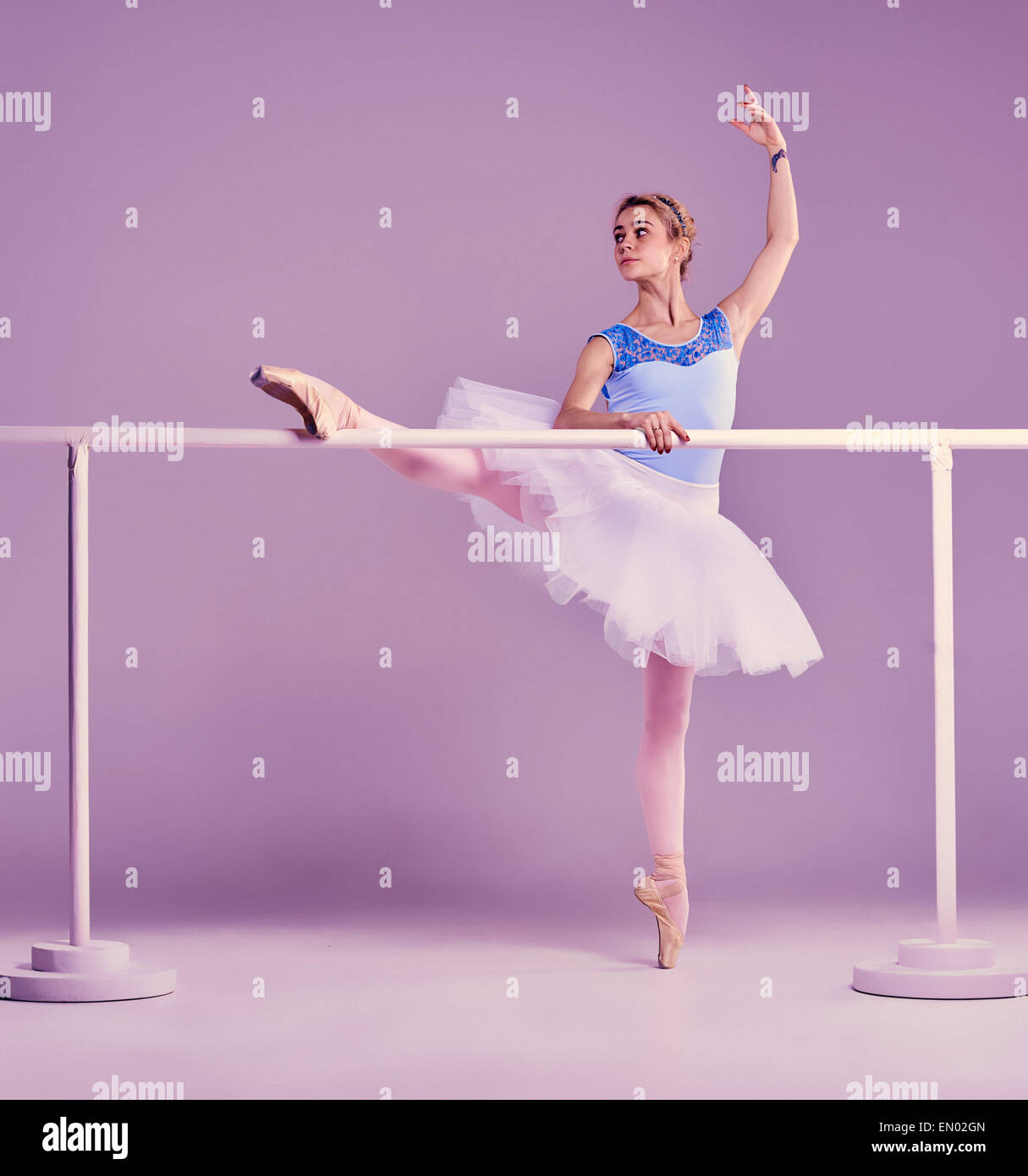 classic ballerina posing at ballet barre Stock Photo - Alamy