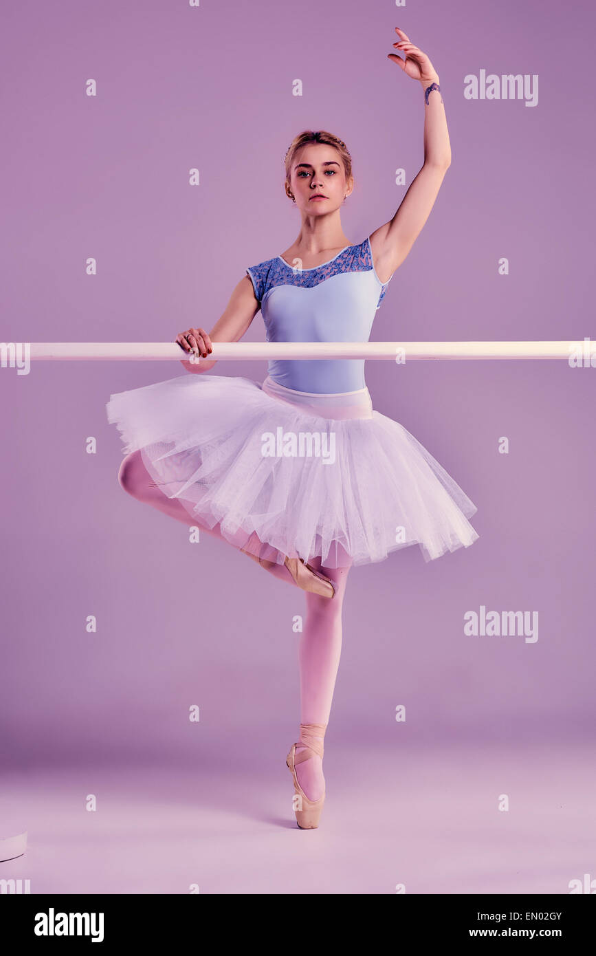classic ballerina posing at ballet barre Stock Photo - Alamy