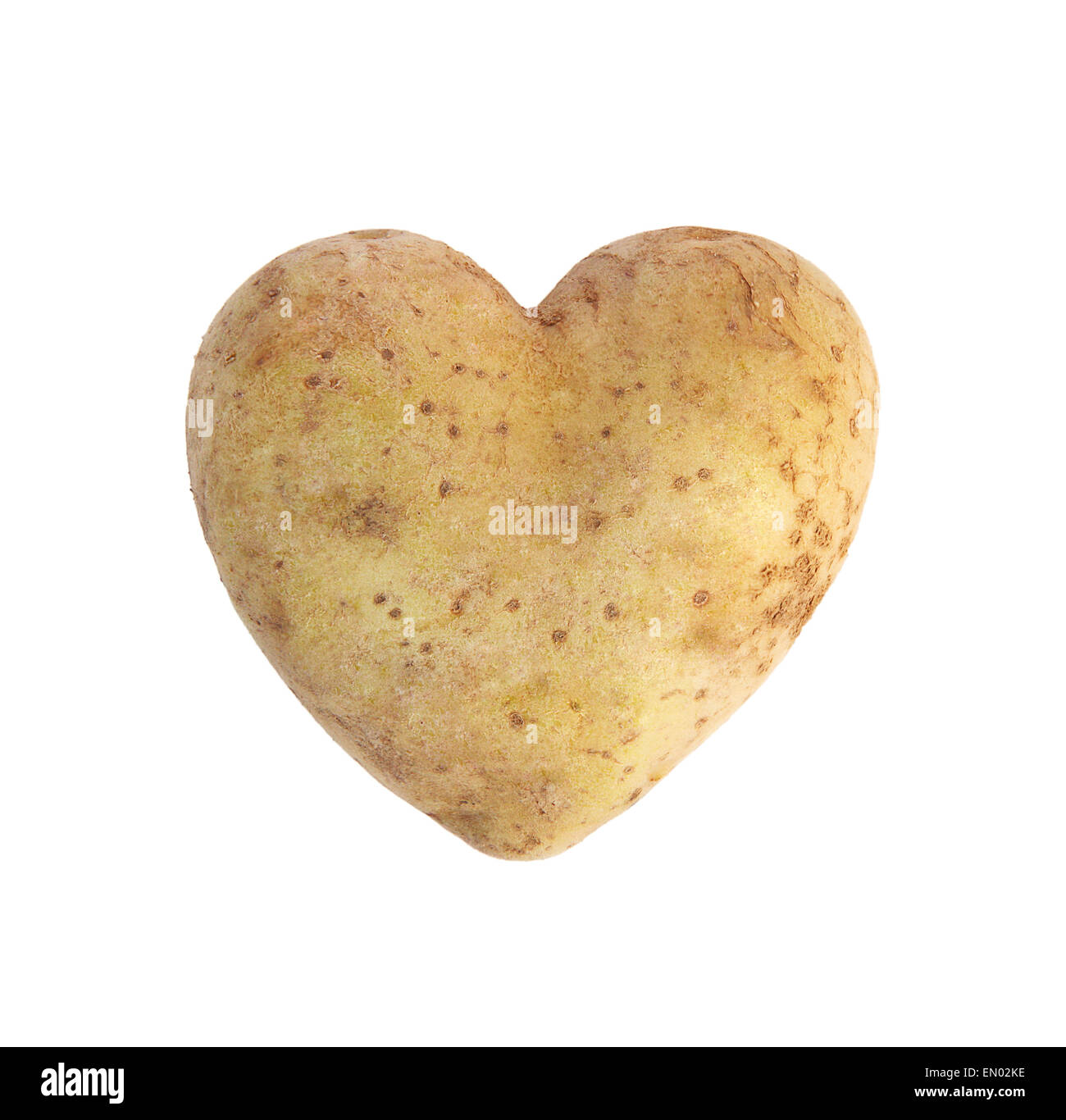 Heart shaped golden potato spud, studio shot, isolated on white Stock ...