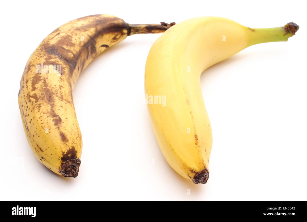 Closeup of bananas - fresh and overripe. Isolated on white background ...