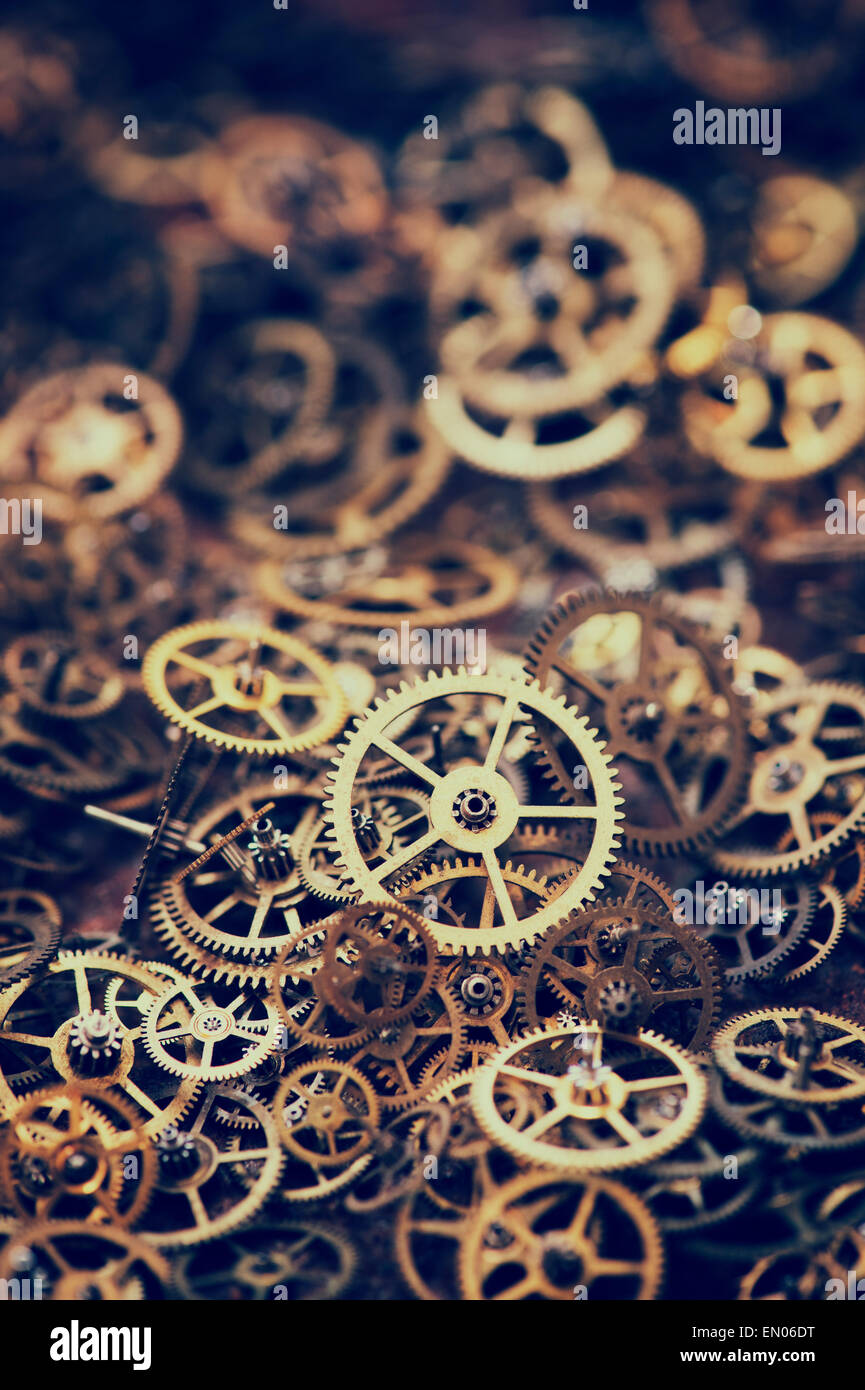 Old pocket watch cogs. Vintage filter applied Stock Photo - Alamy