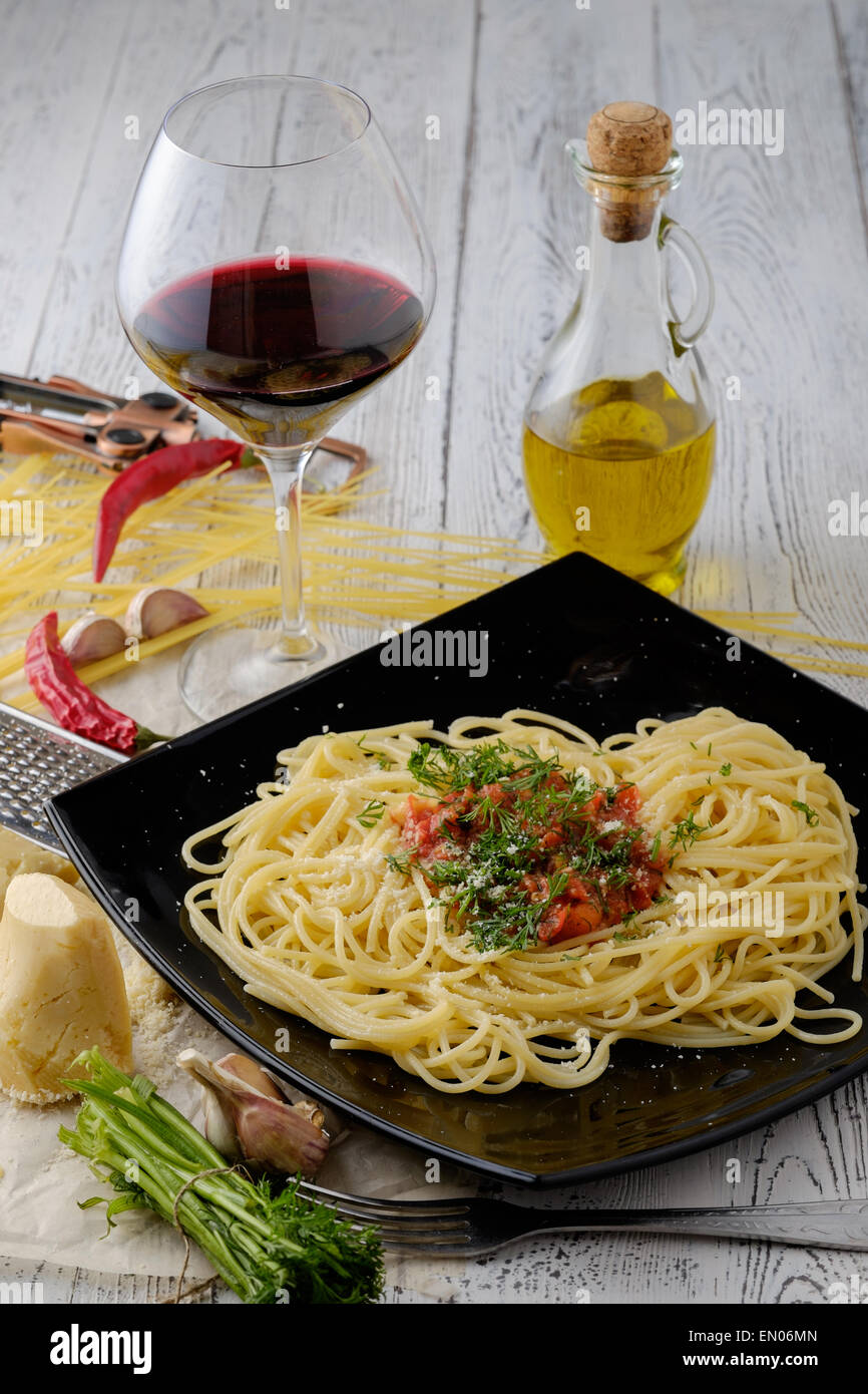 Italian pasta cooked in a rustic style with a sauce of fresh tomatoes ...