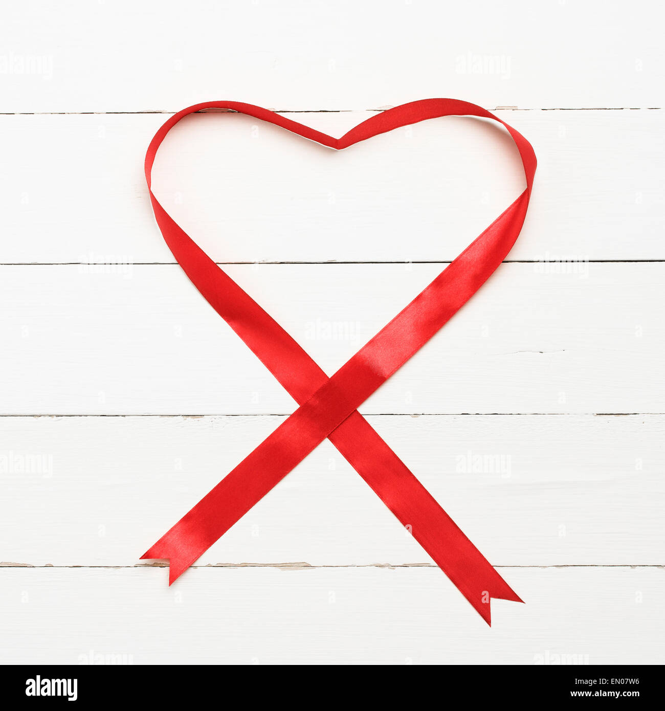 White background with heart shaped ribbon Stock Photo - Alamy