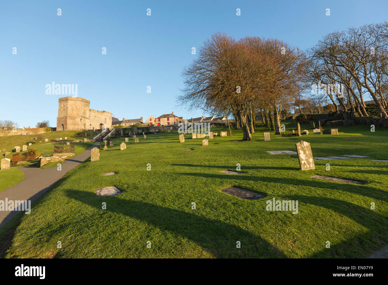 St David's Cathedral graveyard and the gatehouse at sunset Stock Photo ...