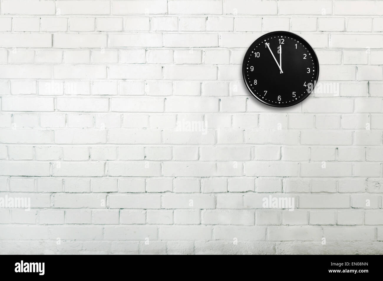 Brick wall with clock Stock Photo - Alamy