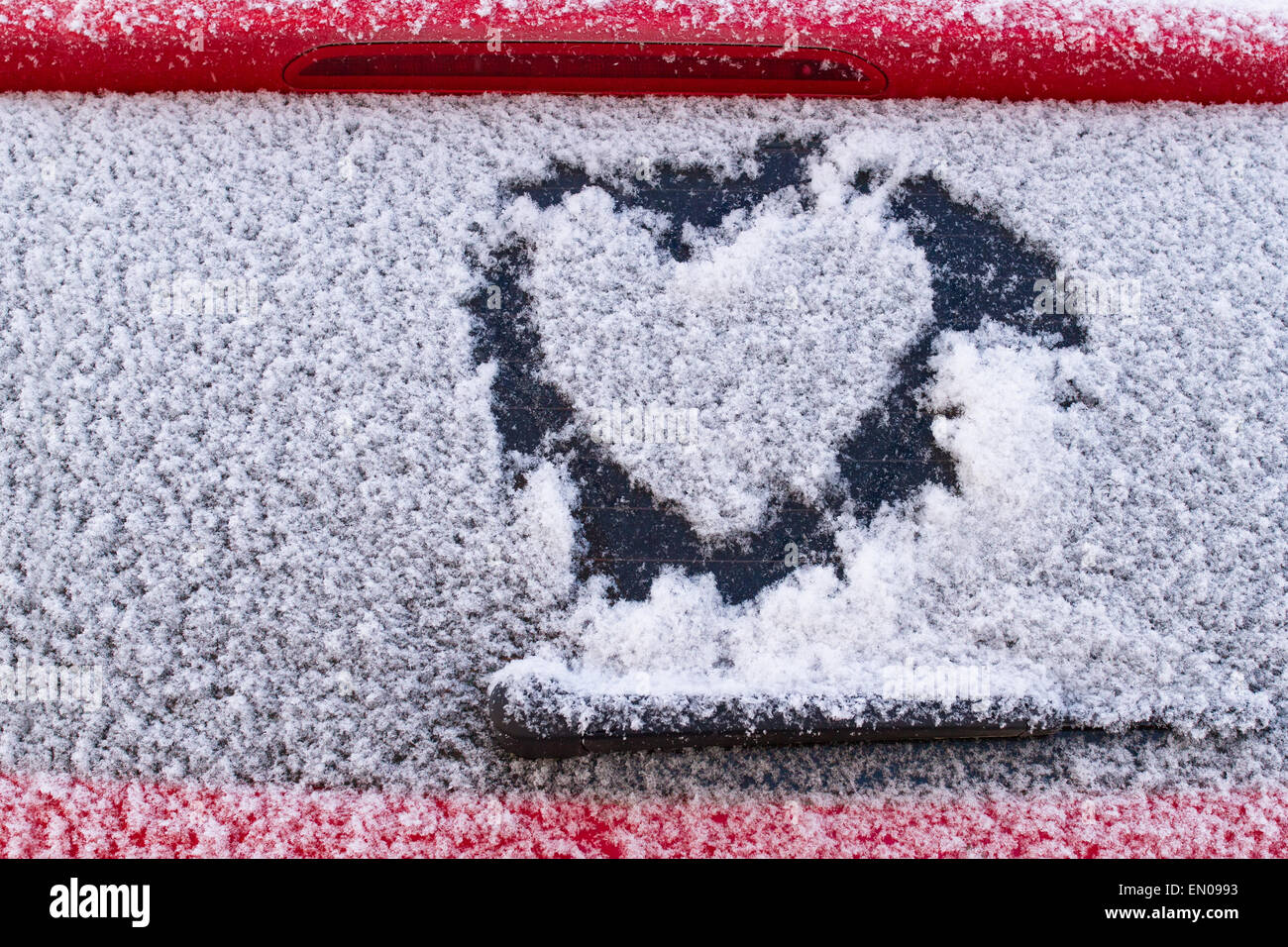 Heart drawn on snowy ice hi-res stock photography and images - Alamy