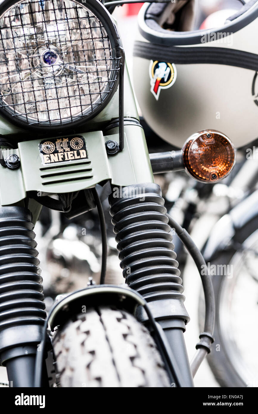 A vintage Enfield Motorcycle and helmet at a motorcycle rally and show ...