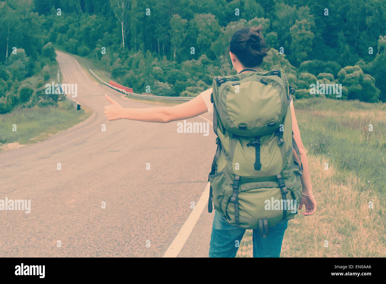 Woman with backpack Stock Photo - Alamy