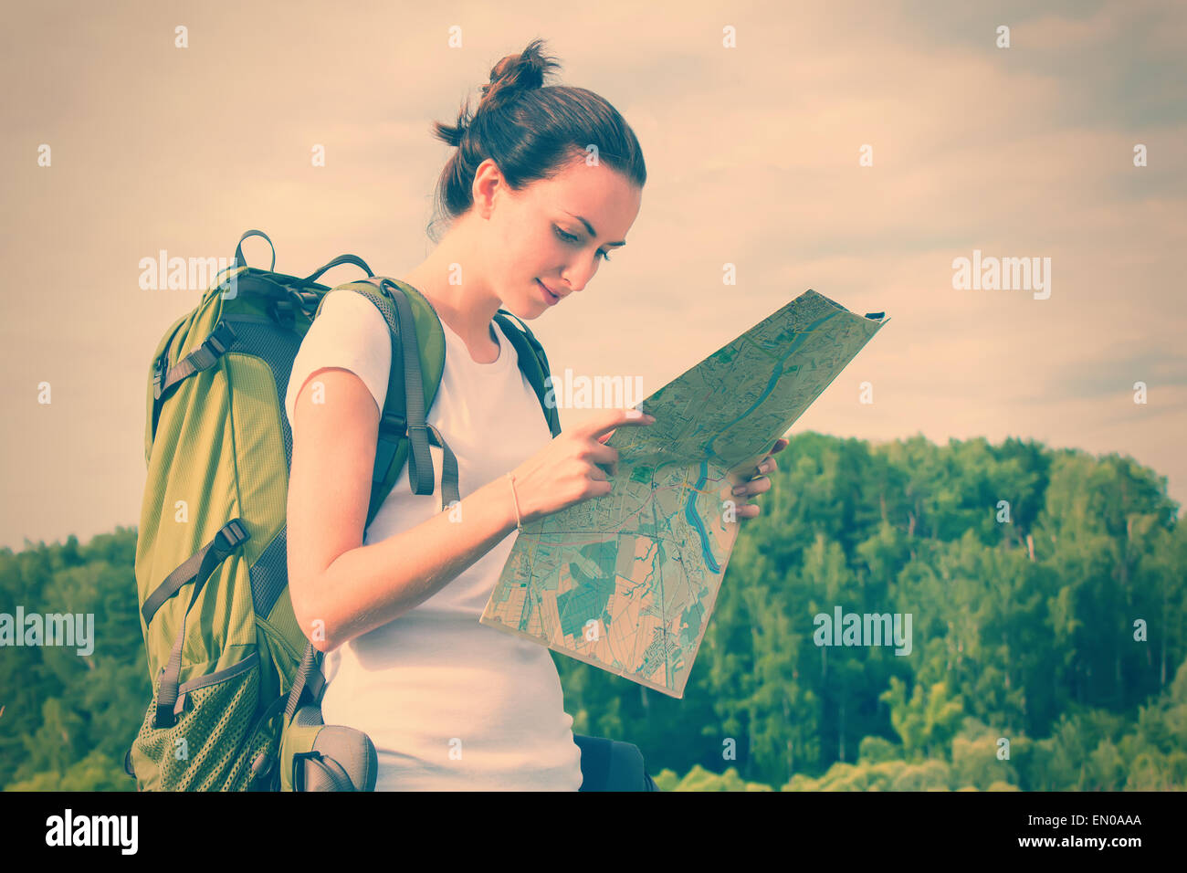 Woman with backpack Stock Photo - Alamy