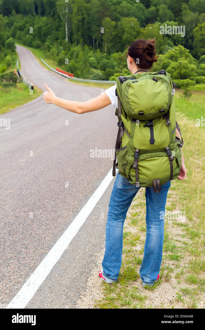 Woman with backpack Stock Photo - Alamy