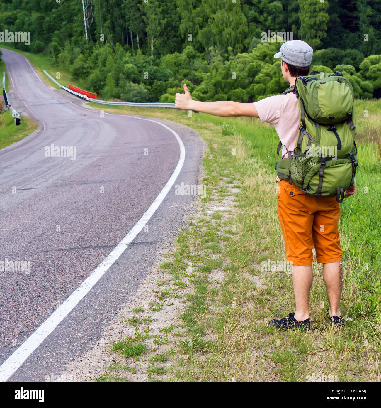 Man with backpack Stock Photo - Alamy