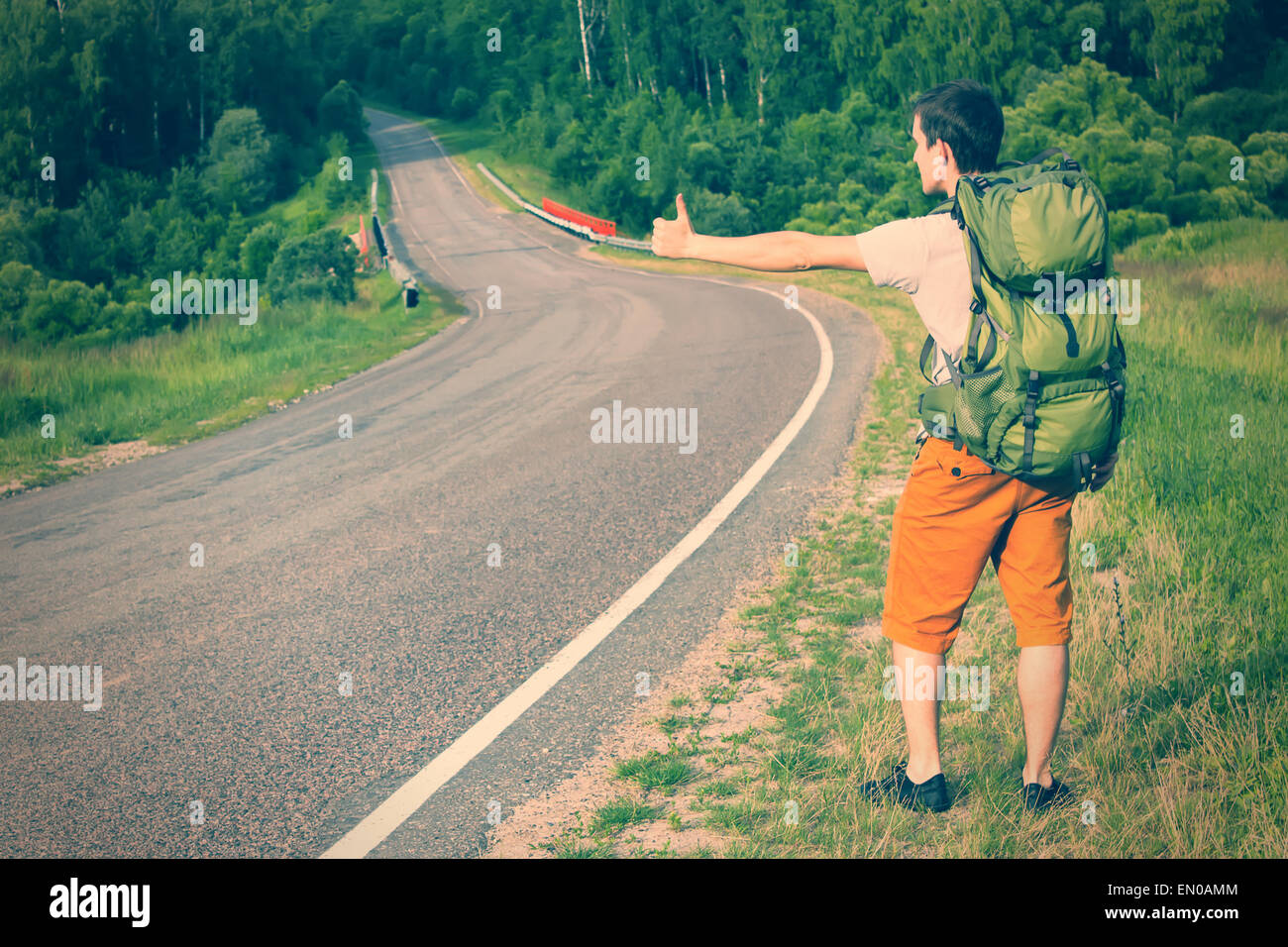Man with backpack Stock Photo - Alamy