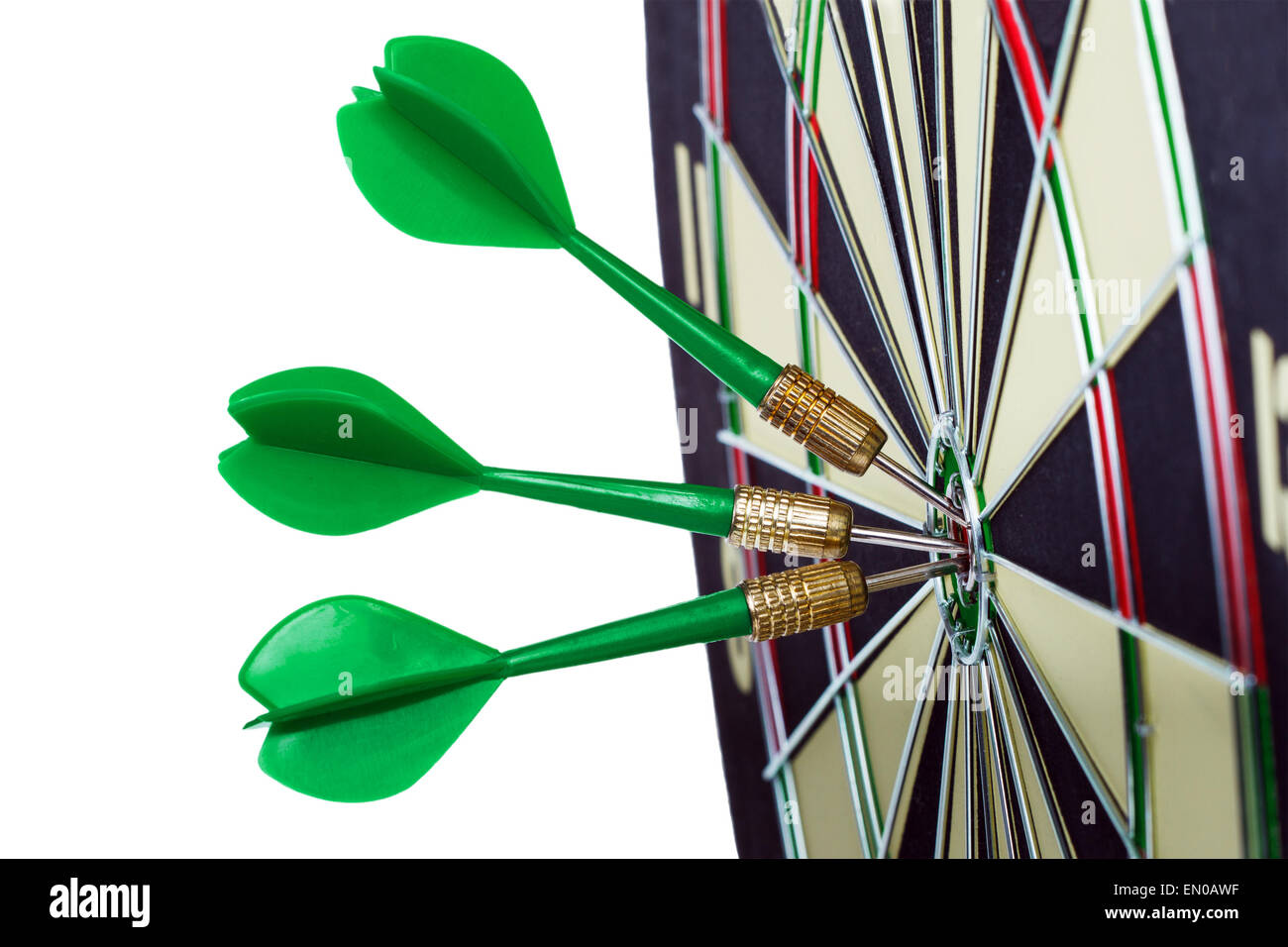 Darts arrows in the target center Stock Photo - Alamy