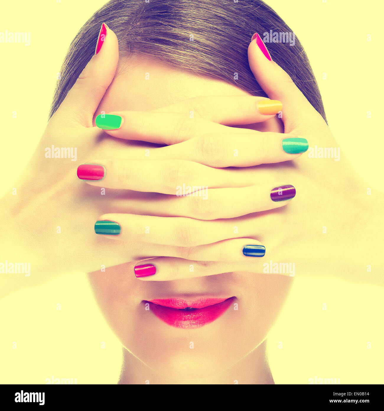Happy woman with colourful manicure Stock Photo - Alamy