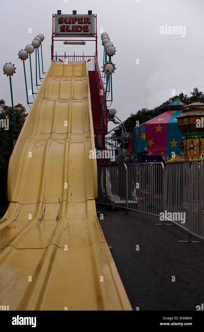 The Super Slide sits waiting for kids to come under a dark and stormy ...