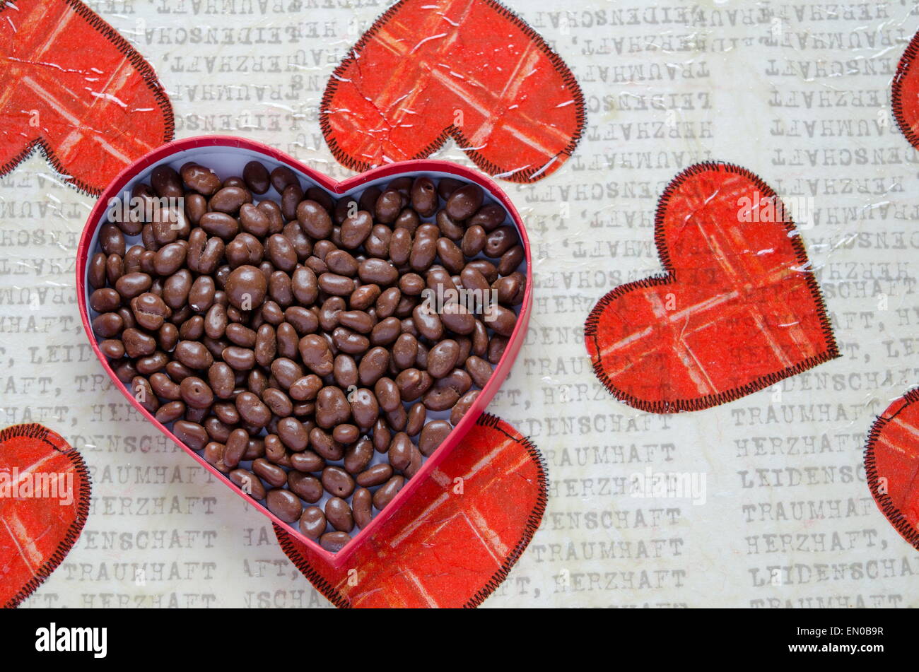 Red heart filled with chocolates hi-res stock photography and images ...