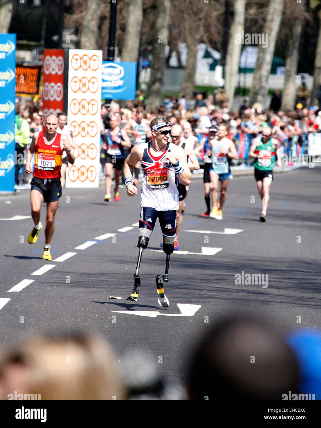 London, UK - April 21, 2013: Disabled runner in the crowds of London ...