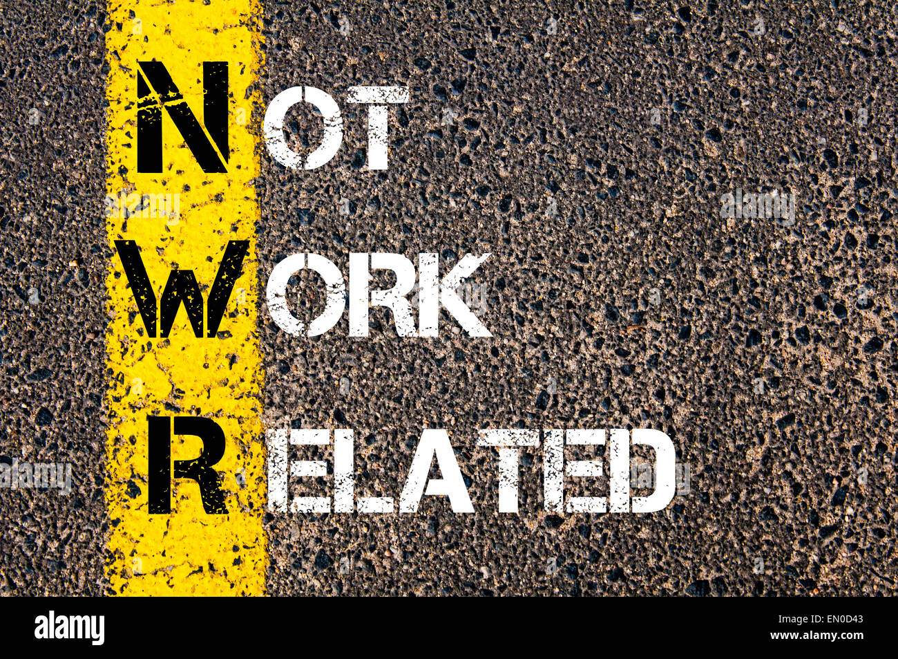 Business Acronym NWR as NOT WORK RELATED. Yellow paint line on the road ...