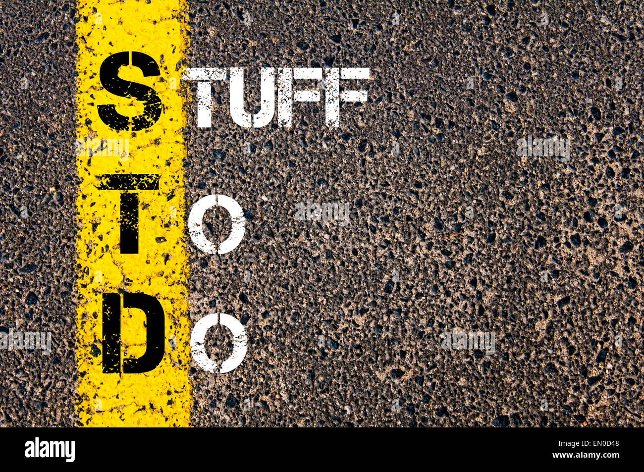 Business Acronym STD as STUFF TO DO. Yellow paint line on the road ...