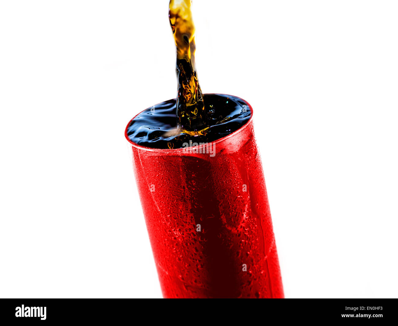 Cola drink splash in red bottle cube on white background Stock Photo ...