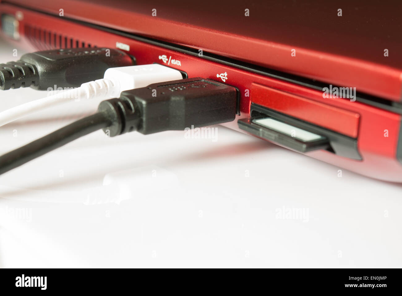 Sd card and USB, HDMI cable are connecting to laptop computer Stock ...