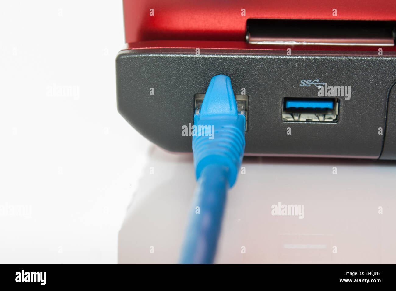 USB cable and Lan cable are connecting to laptop computer Stock Photo ...