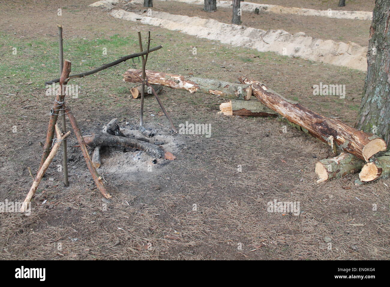 cozy fireplace with benches nice place for summer camp Stock Photo - Alamy