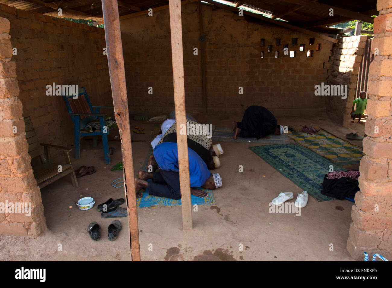 Poor muslim man praying in hi-res stock photography and images - Alamy