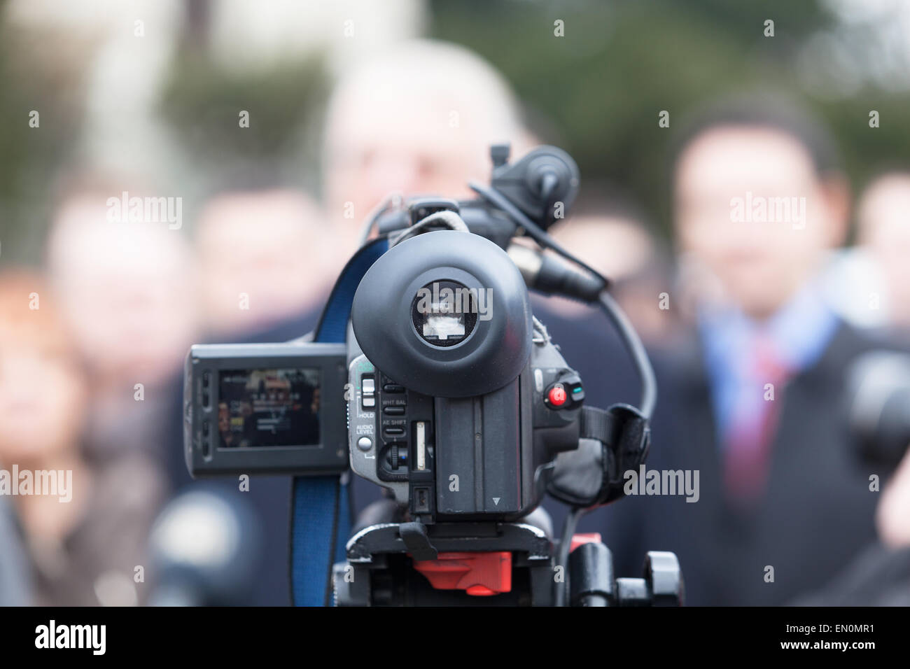 filming an event with a video camera Stock Photo - Alamy