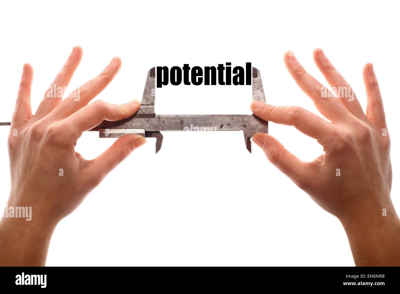 Color horizontal shot of two hands holding a caliper and measuring the ...