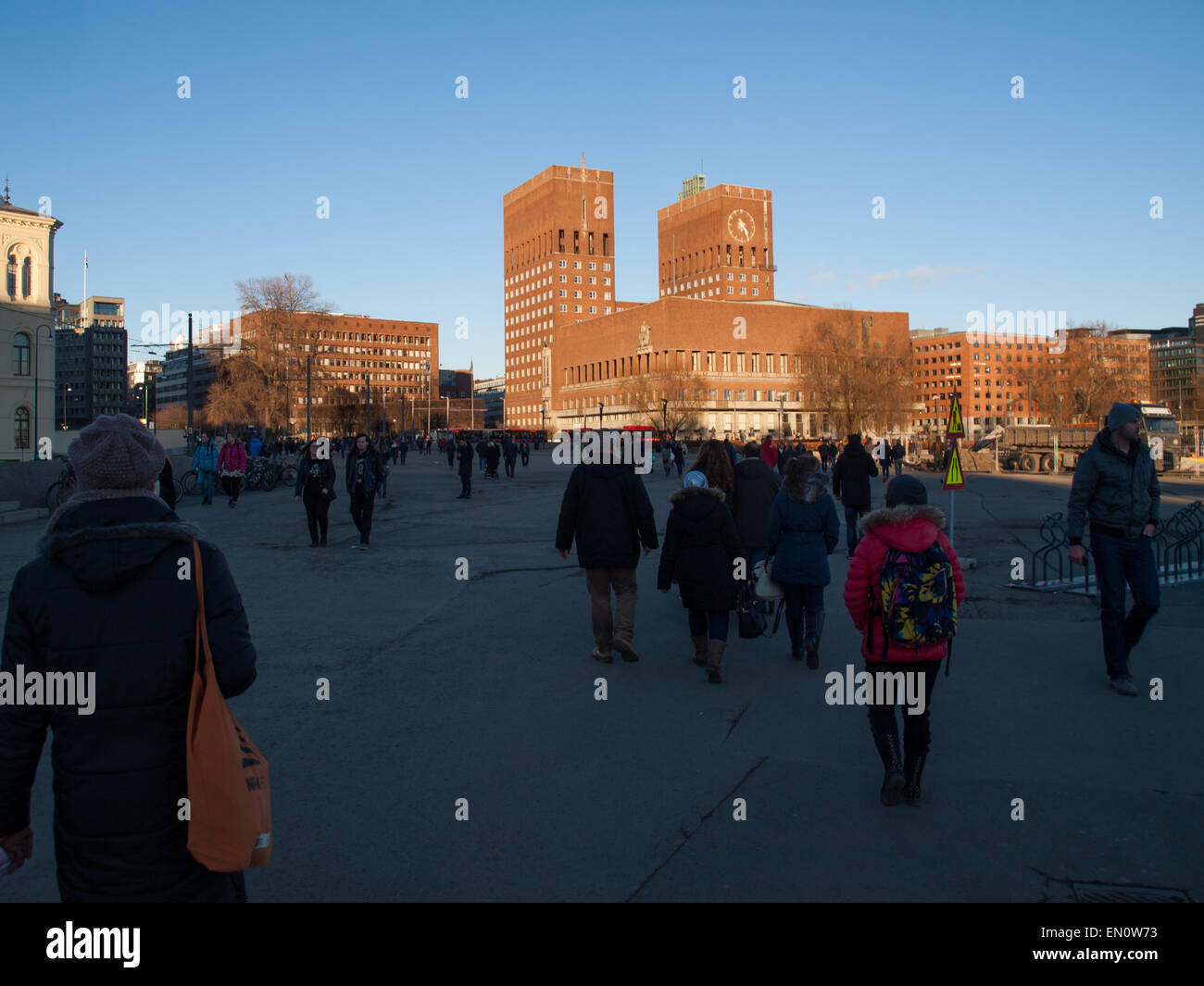 People on Oslo sreet with city council in background Stock Photo - Alamy