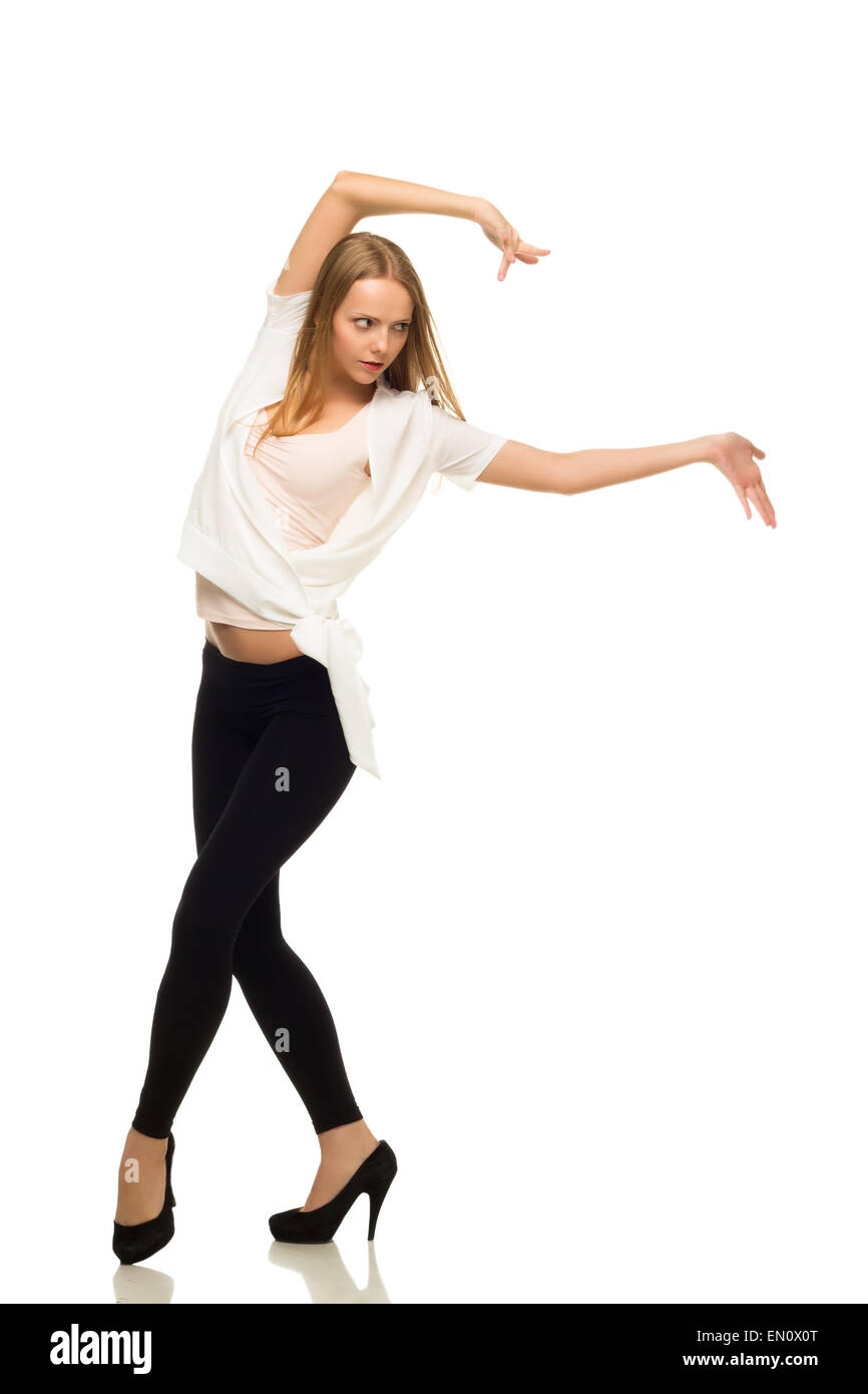 Young beautiful modern dancer performing isolated over white bac Stock ...