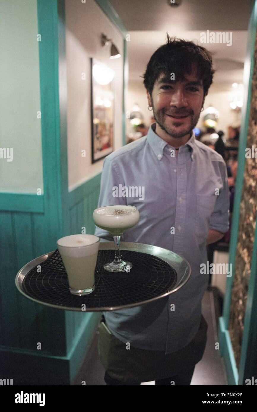 Ceviche Peruvian restaurant in Soho,London: waiter with pisco sour ...