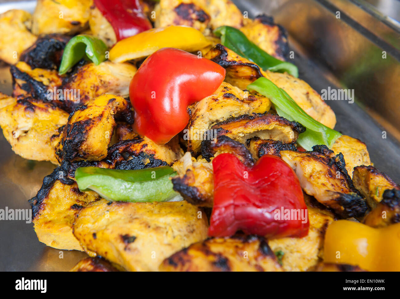 Closeup detail of chicken reshmi kebab pieces on display at an indian ...