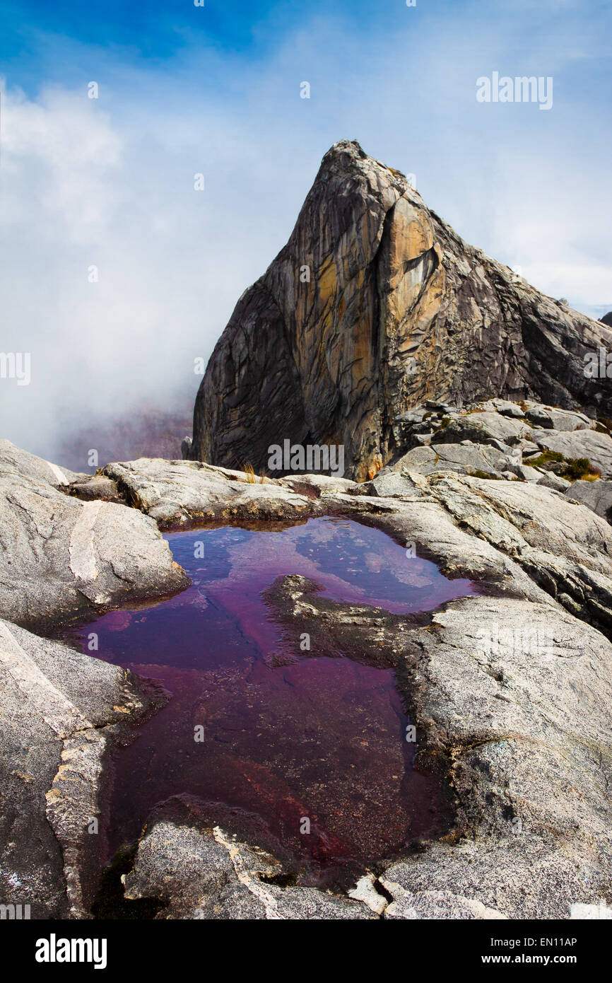 Clean mountain water on the red rock Stock Photo - Alamy