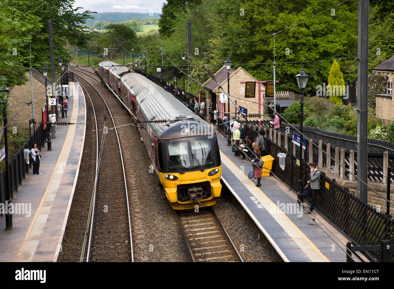 UK, England, Yorkshire, Bradford, Metro train from Skipton at Saltaire ...