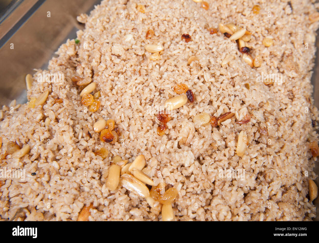 Oriental rice dish with peanuts on display at a hotel restaurant buffet ...