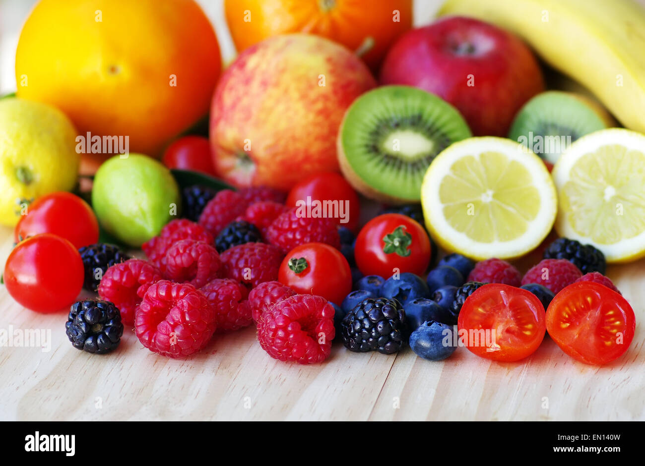 ripe wild fruits on table Stock Photo - Alamy